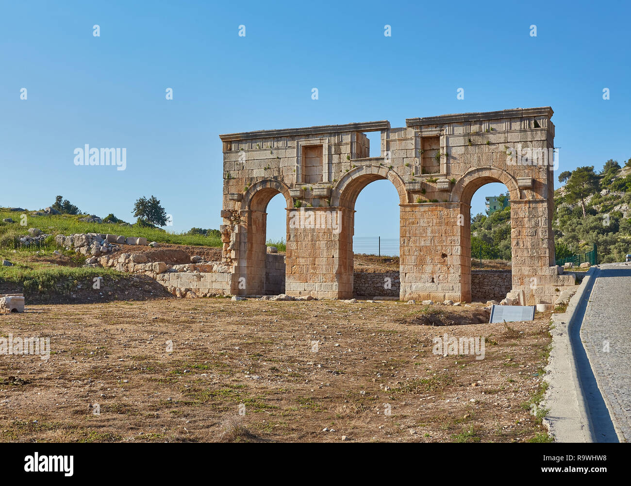 The well preserved ancient triple arched Triumphal Arch located at the ...