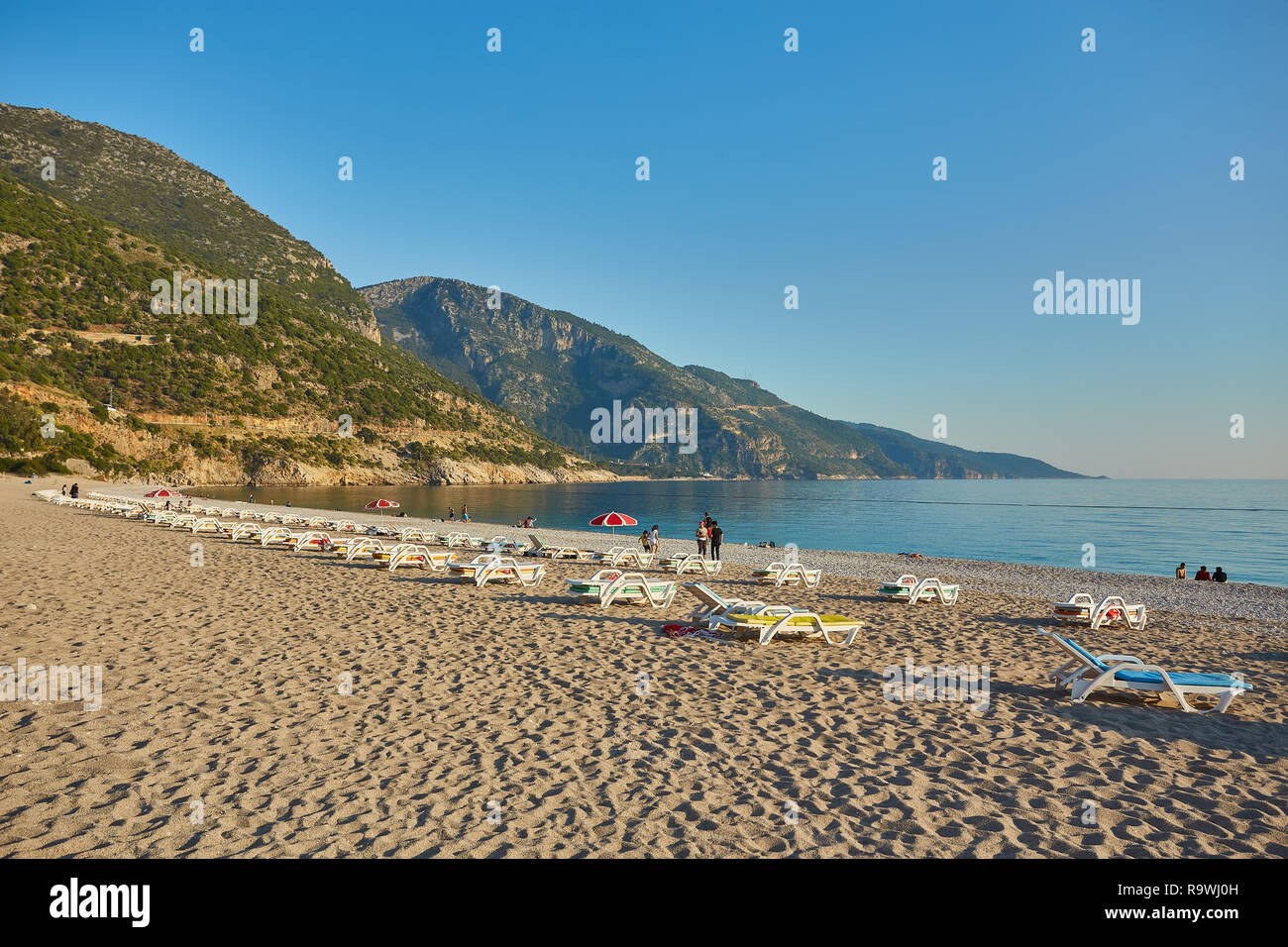 Sun beds along the shores of the Mediterranean Sea, Oludeniz, Turkey ...