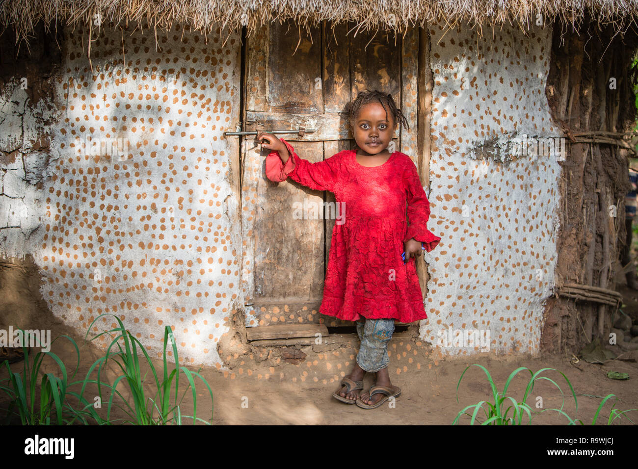Girl in hut hi-res stock photography and images - Alamy