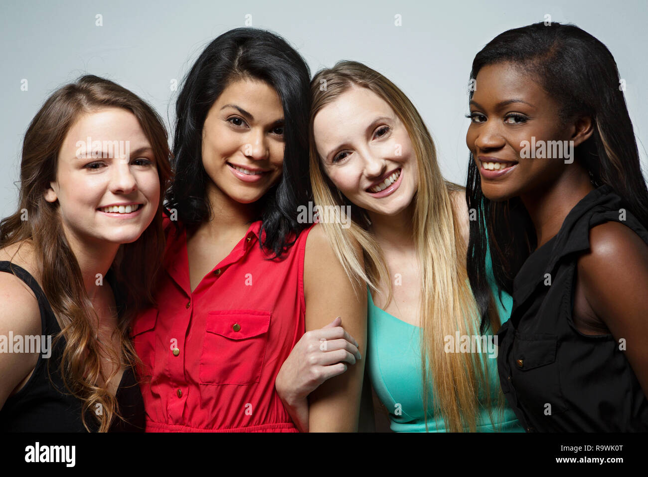 Happy and smiling multicultural woman isolated on white Stock Photo - Alamy