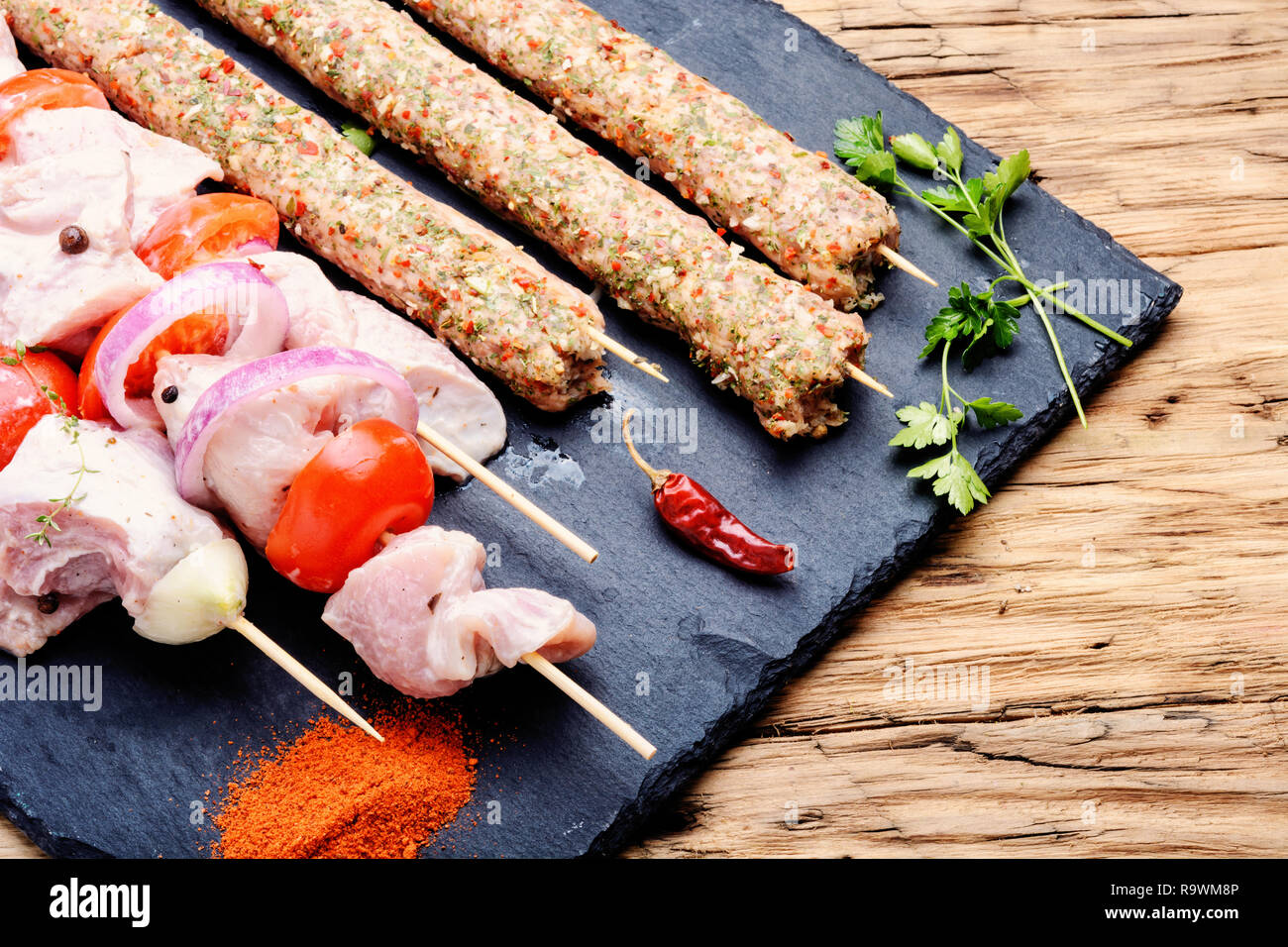Assortment of raw kebabs and shashlik.Meat dishes.Bbq Stock Photo - Alamy