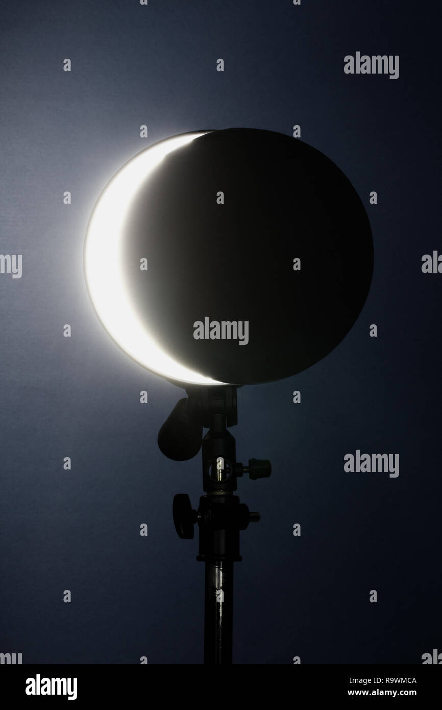 a crescent made of photographic lighting. total lunar eclipse Stock ...