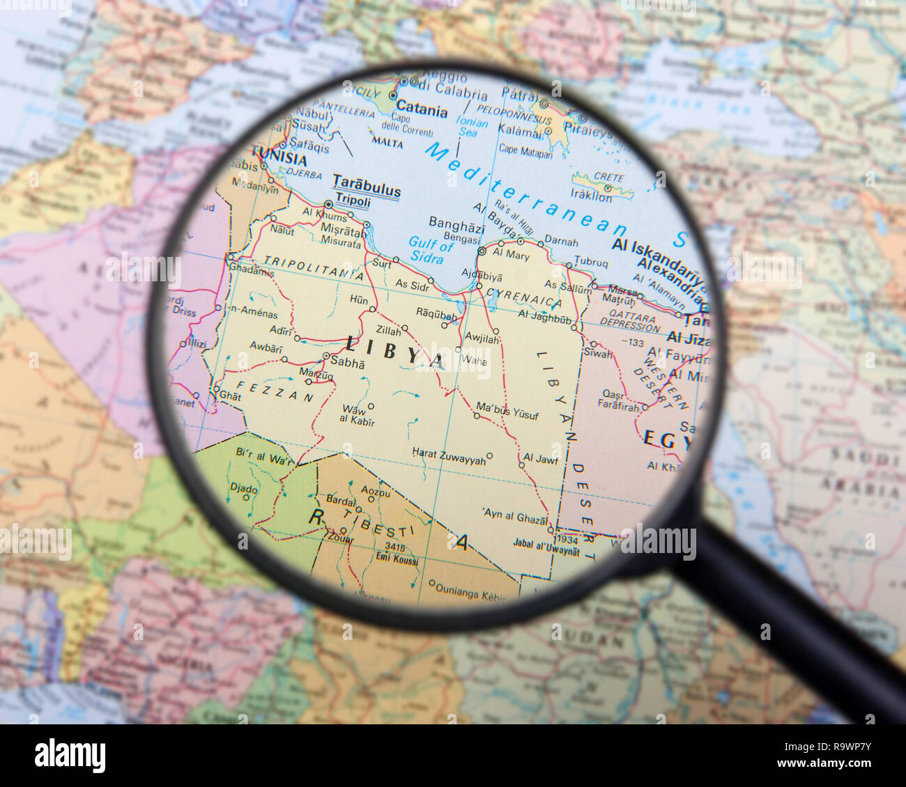 Map city under magnifying glass hi-res stock photography and images - Alamy