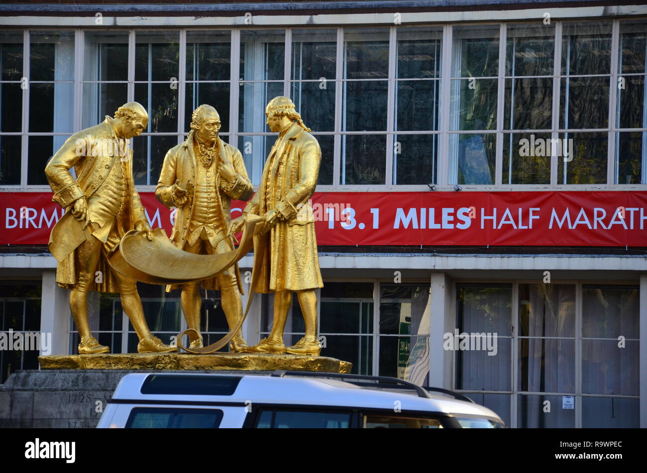 Golden statues in center of Birmingham city, England Stock Photo - Alamy
