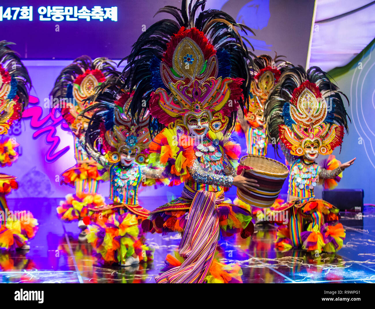 Filipino dancers from the Masskara festival of Bacolod perform at the ...