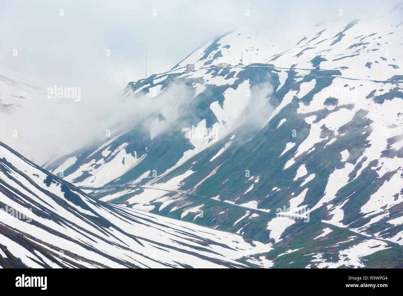 Spring cloudy overcast mountain landscape (Oberalp Pass, Switzerland ...