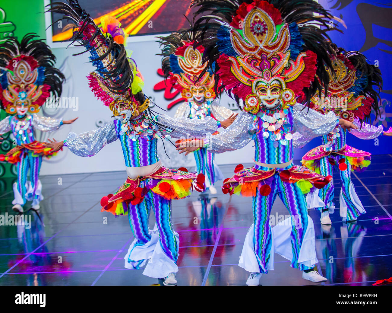 Filipino dancers from the Masskara festival of Bacolod perform at the ...