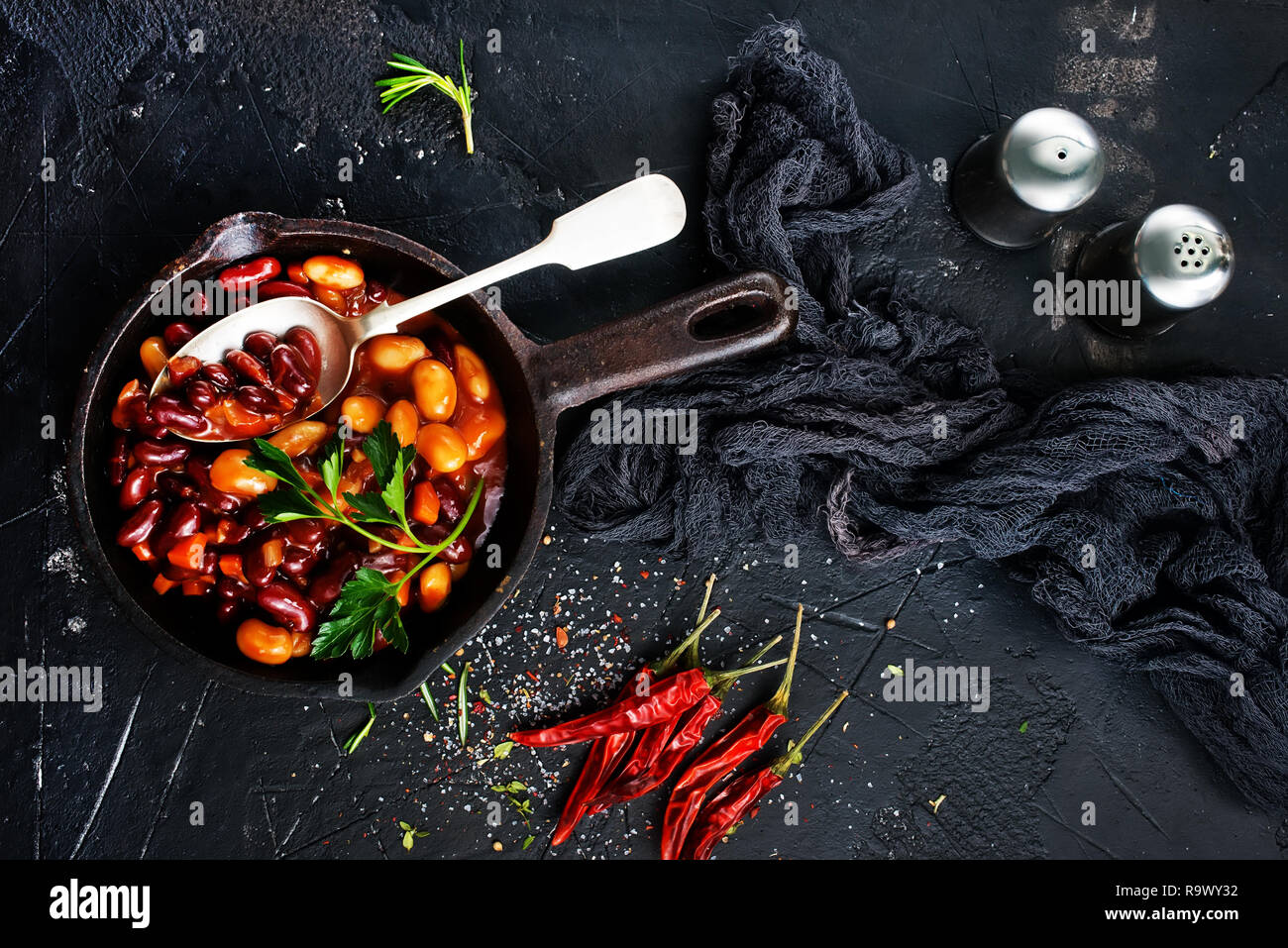 fried beans in metal pan, fried beans with tomato sauce Stock Photo - Alamy