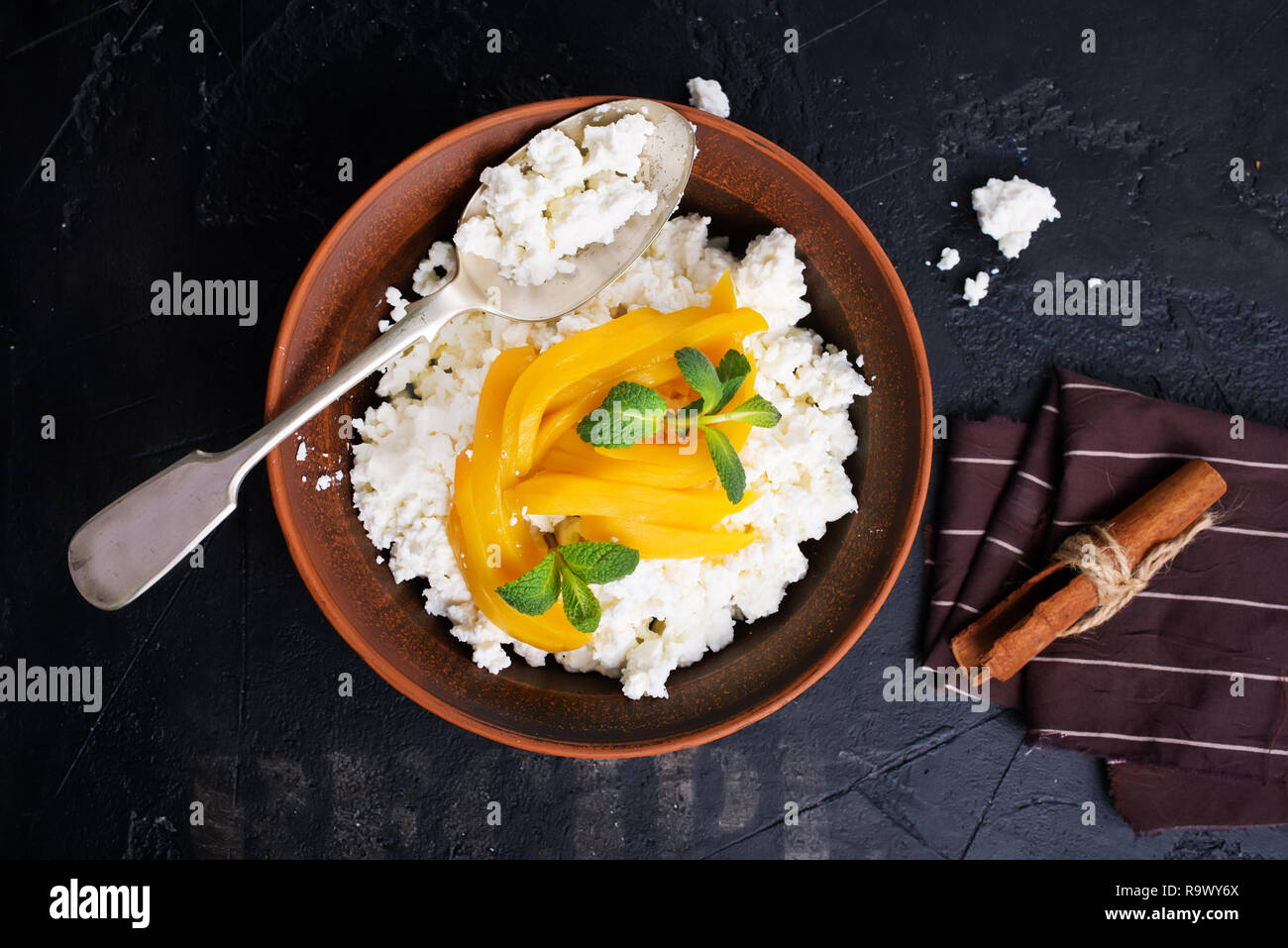 cottage cheese with mango, desert with mango Stock Photo - Alamy
