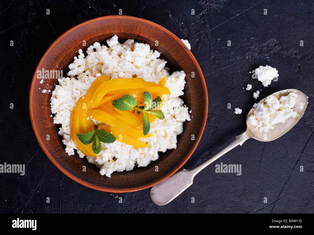 cottage cheese with mango, desert with mango Stock Photo - Alamy