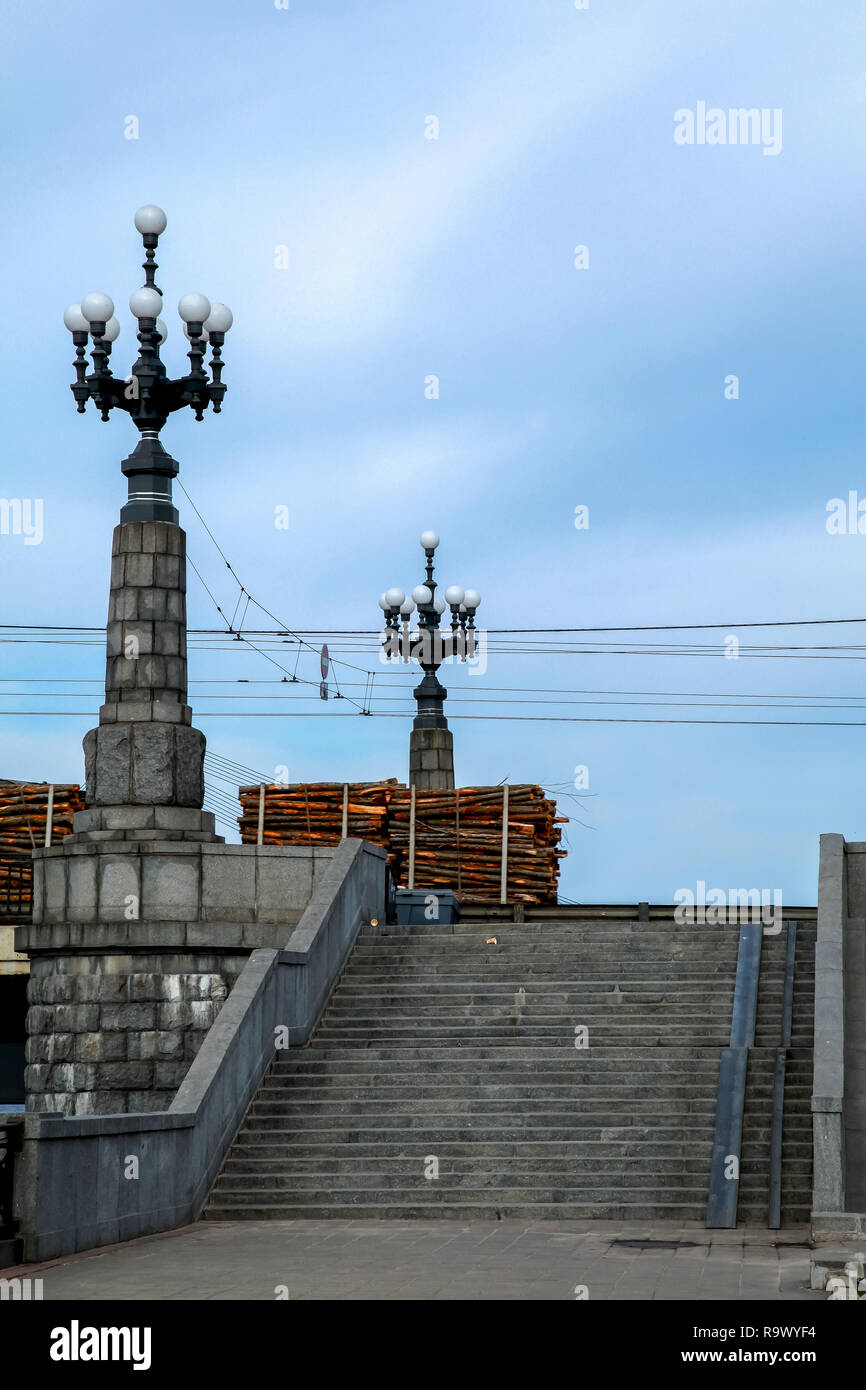 View of the Akmens bridge from the 11th November Embankment. Stairs to ...