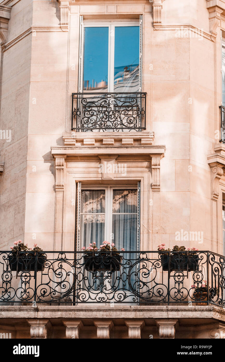 View from below on a facade European building with balconies in Paris ...