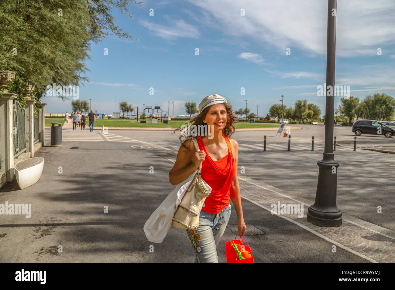 European girl going shopping in Rimini Stock Photo - Alamy