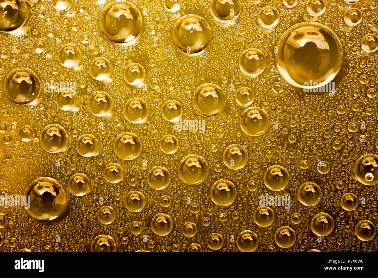Drops of gold hi-res stock photography and images - Alamy