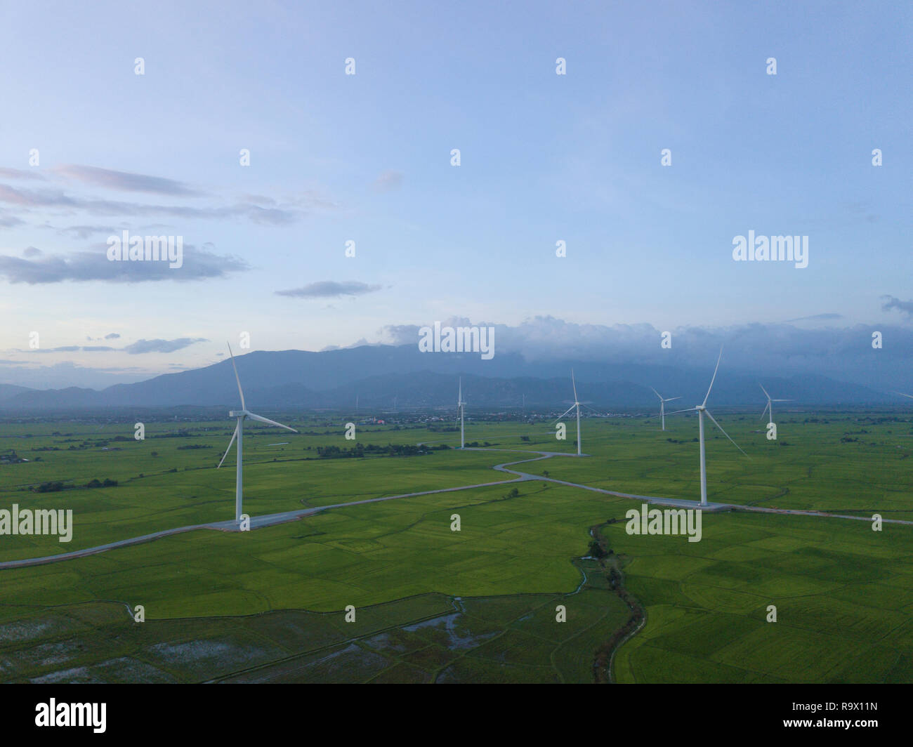 Wind turbine farm or windmill on blue sky. Turbine green energy ...