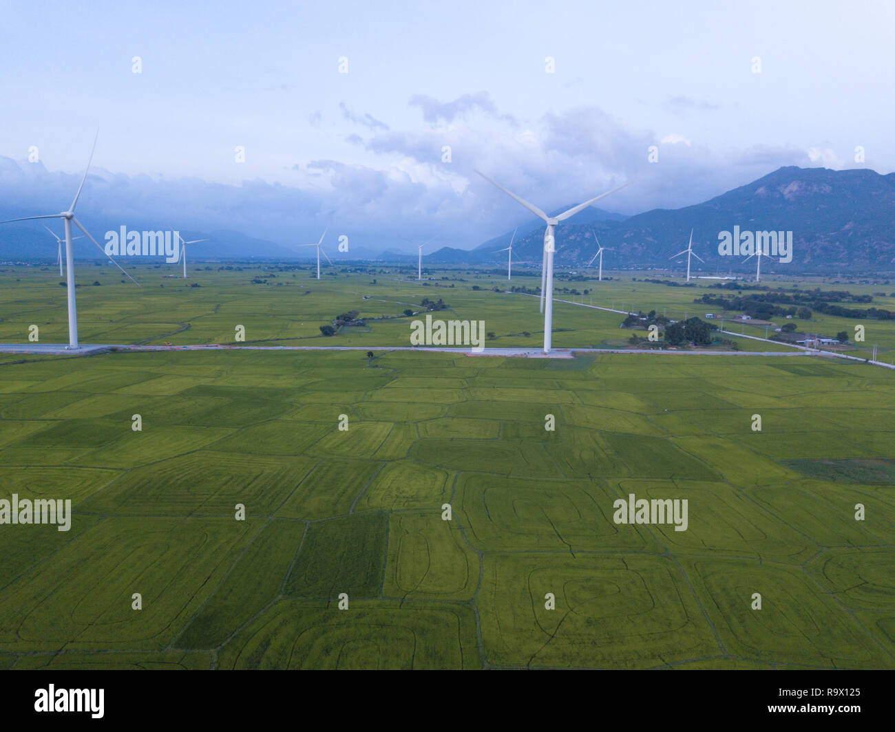 Wind turbine farm or windmill on blue sky. Turbine green energy ...