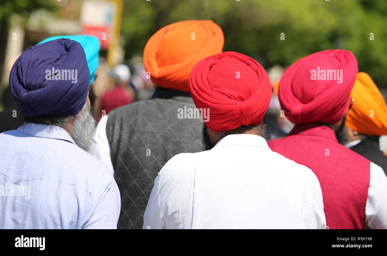 Sikh men wear colorful turbans during a religious event Stock Photo - Alamy