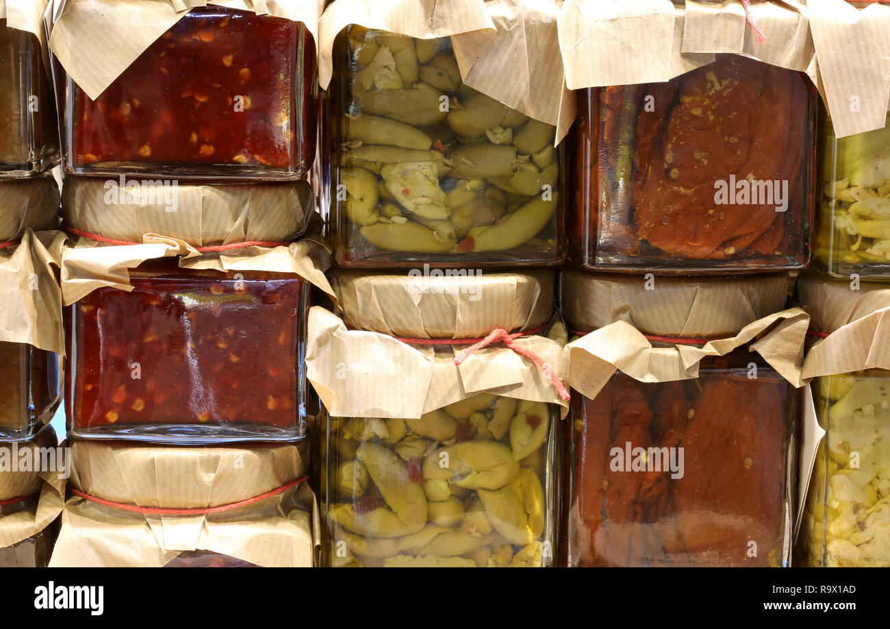 jars with peppers and pickled vegetables prepared by hand in Southern ...