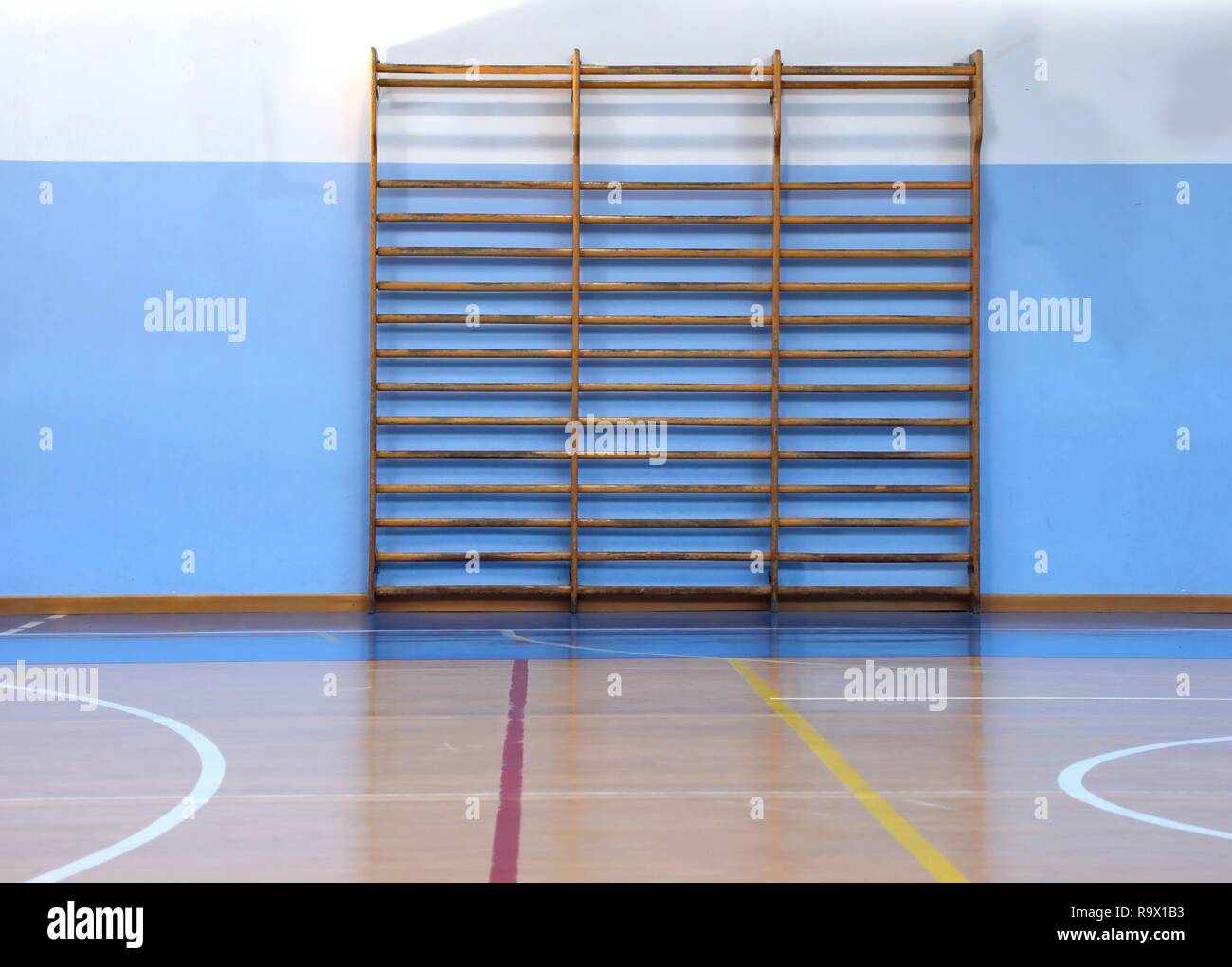 wooden wall bars in the big empty gym without the athletes Stock Photo ...
