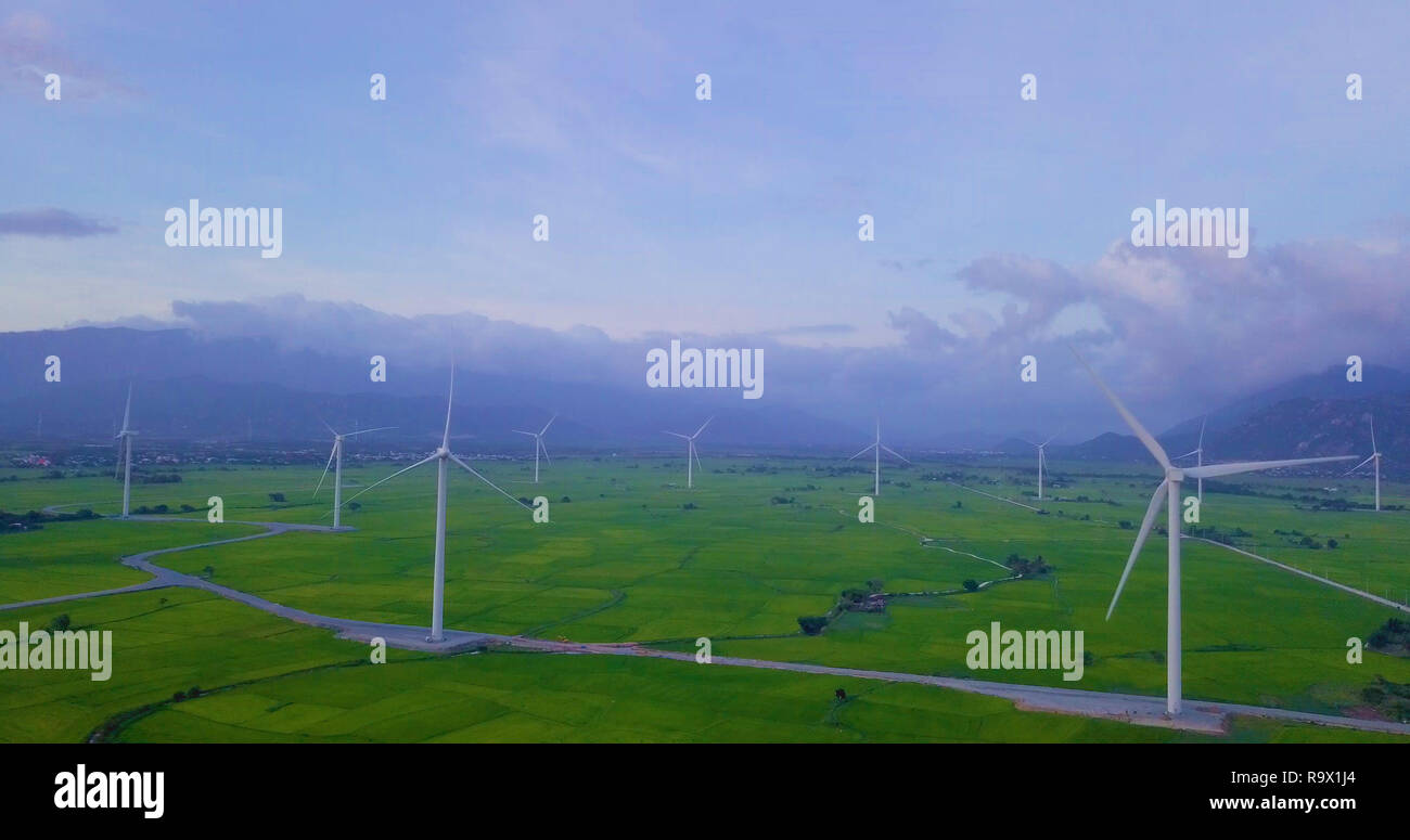 Wind turbine farm or windmill on blue sky. Turbine green energy ...
