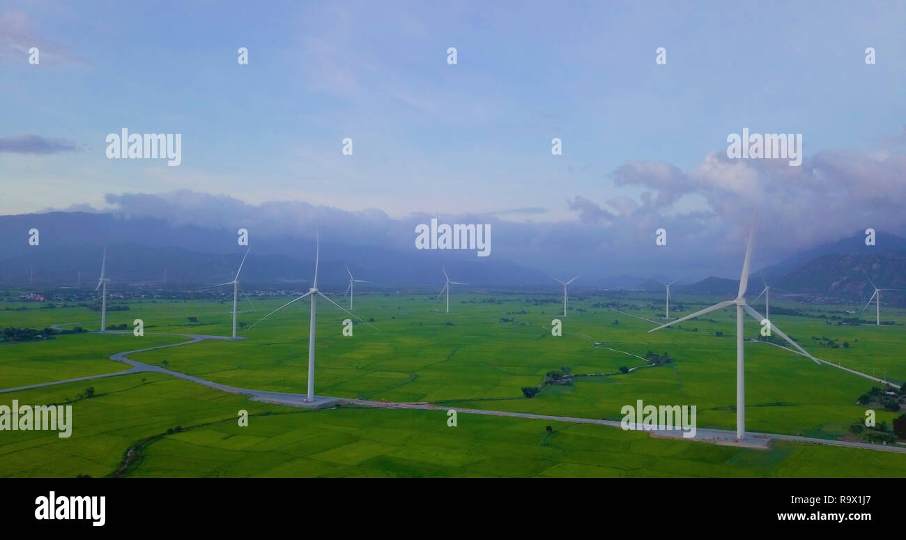 Wind turbine farm or windmill on blue sky. Turbine green energy ...