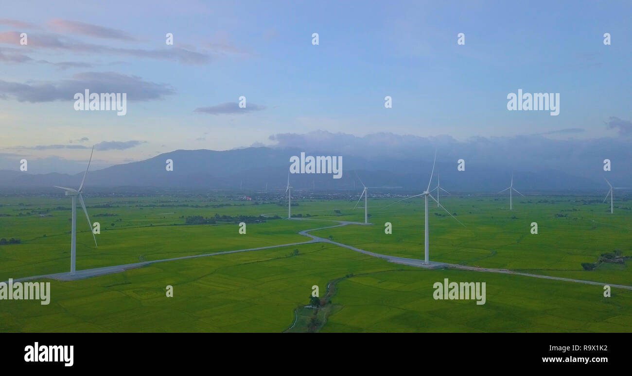 Wind turbine farm or windmill on blue sky. Turbine green energy ...