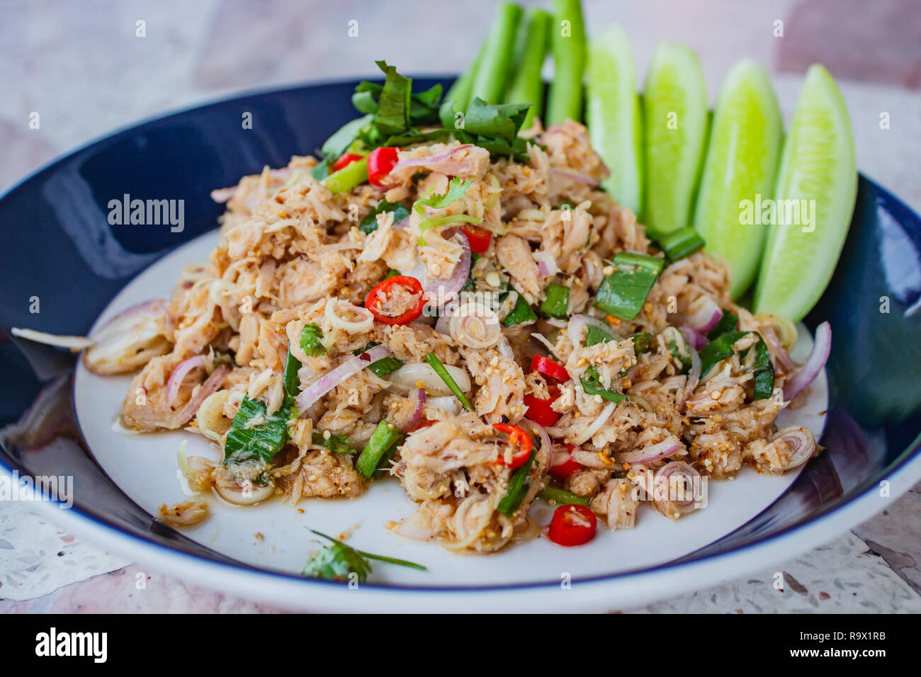 Tuna spicy salad with herbs, homemade thai style Stock Photo - Alamy