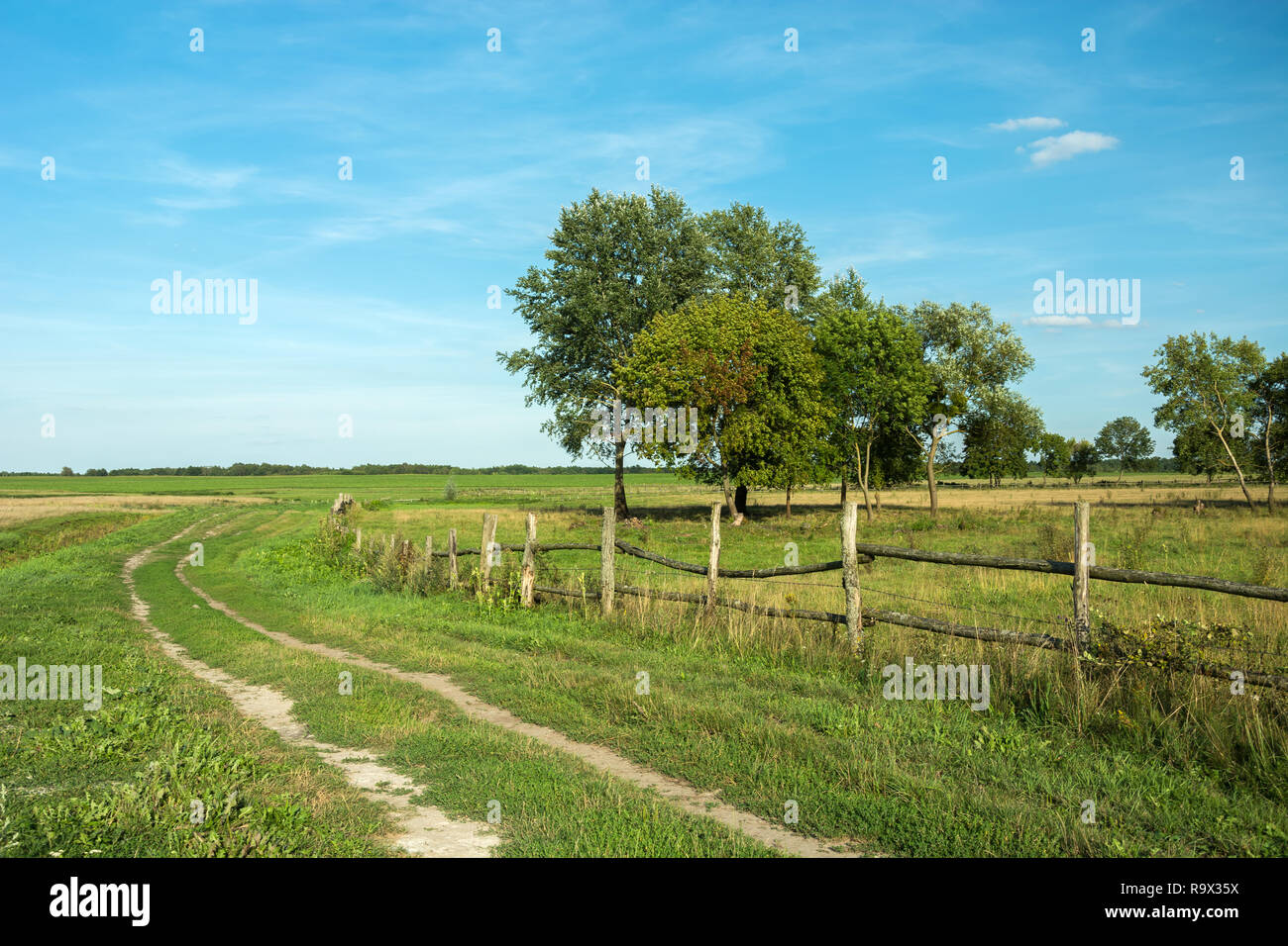 Village road through agricultural field hi-res stock photography and ...