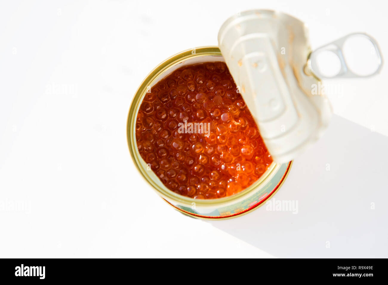 salmon caviar in an open tin can Stock Photo - Alamy