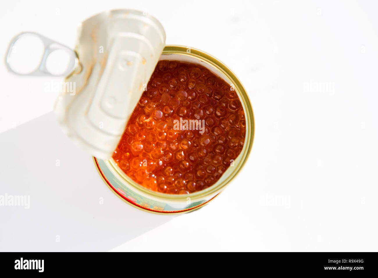 salmon caviar in an open tin can Stock Photo - Alamy