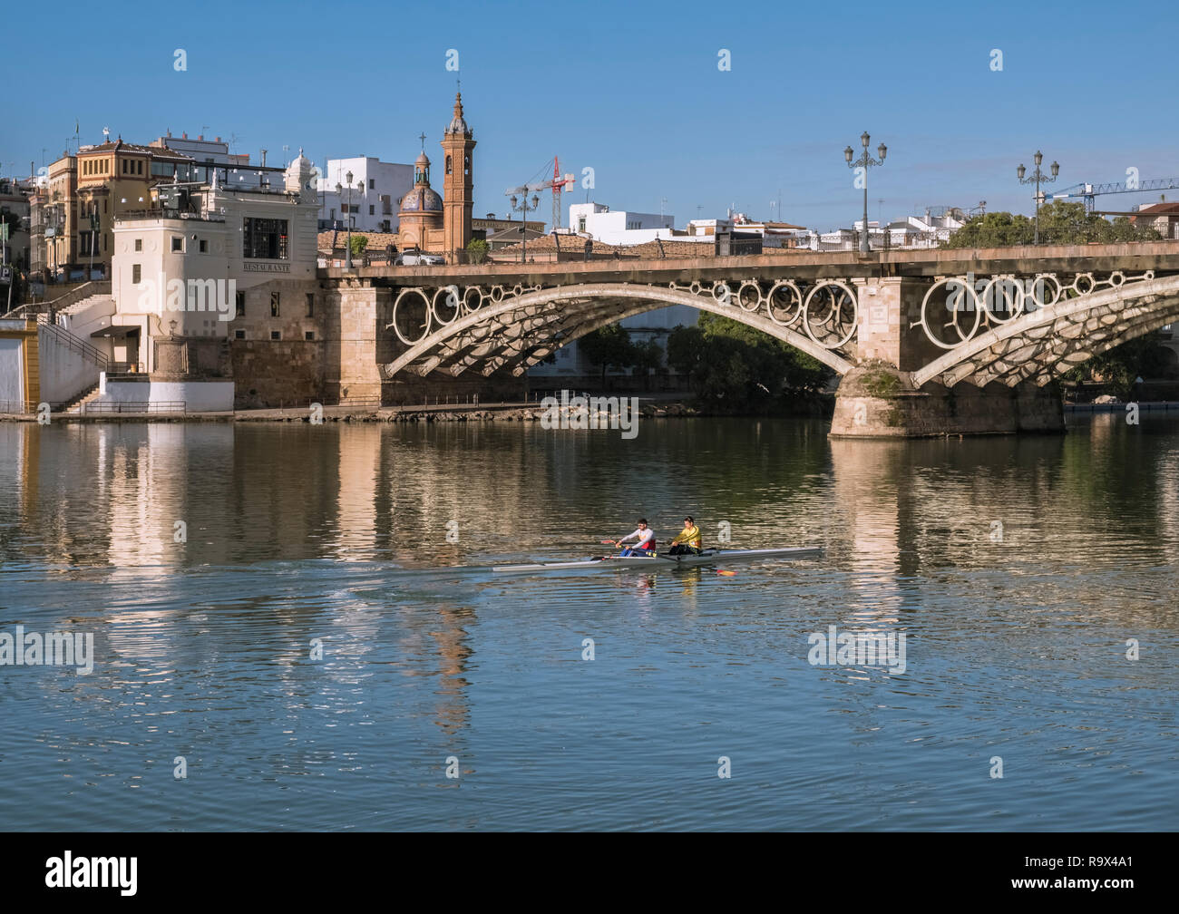 Isabel II bridge, better known as Puente de Triana bridge, as it ...