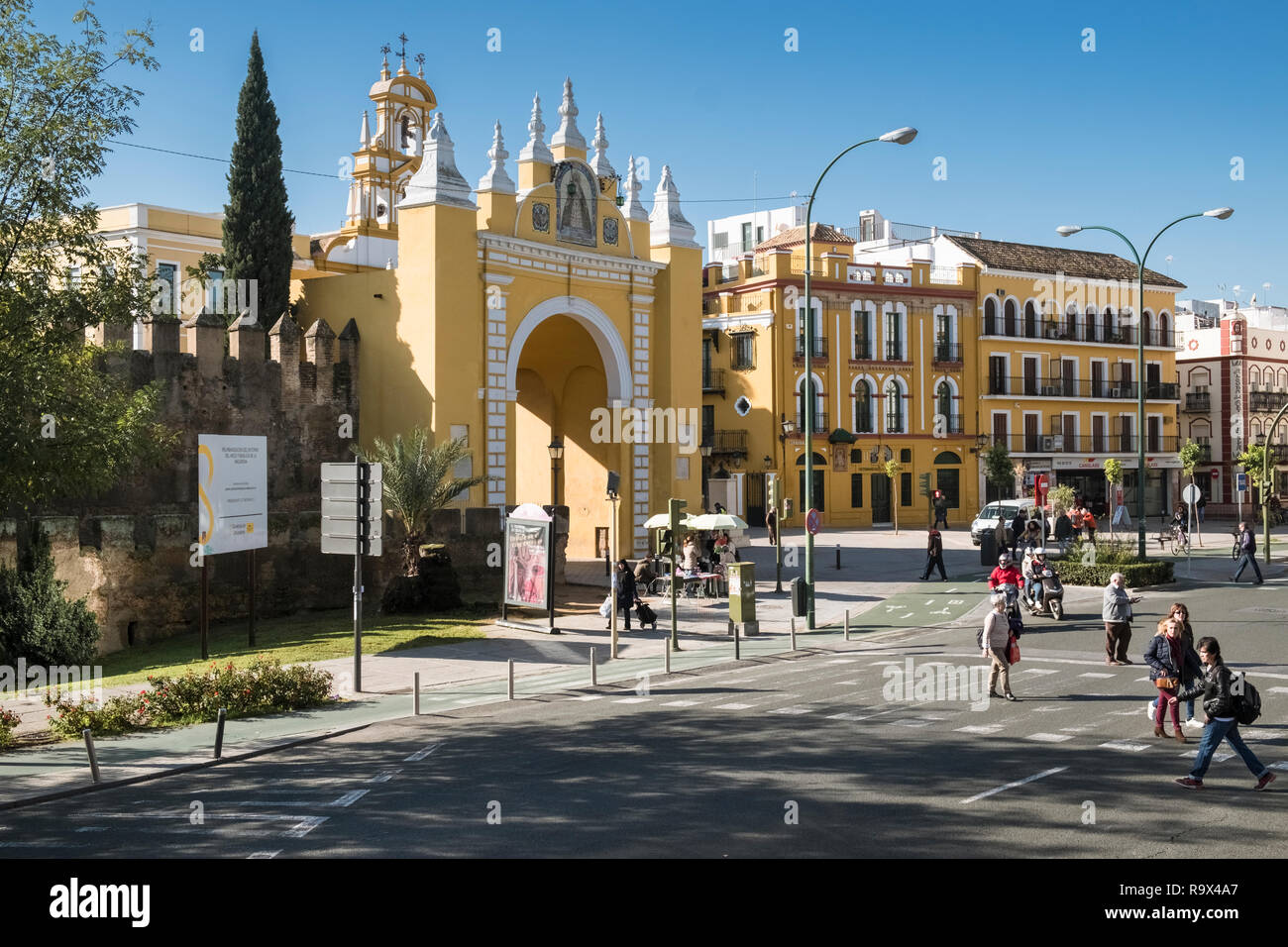 The Macarena Gate, part of the historic city walls, and a working class ...