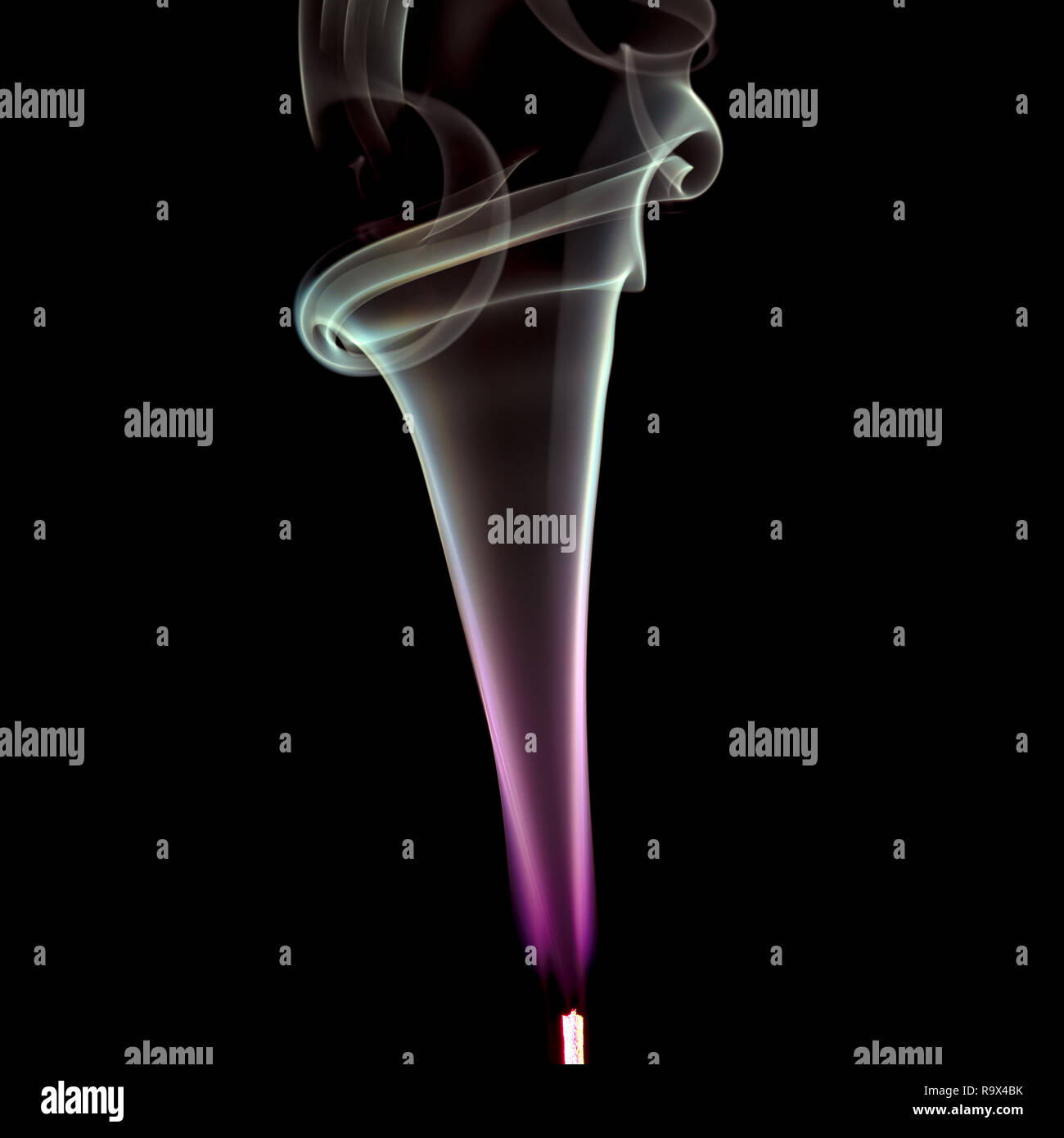 Colorful smoke of incence stick isolated at black background Stock ...