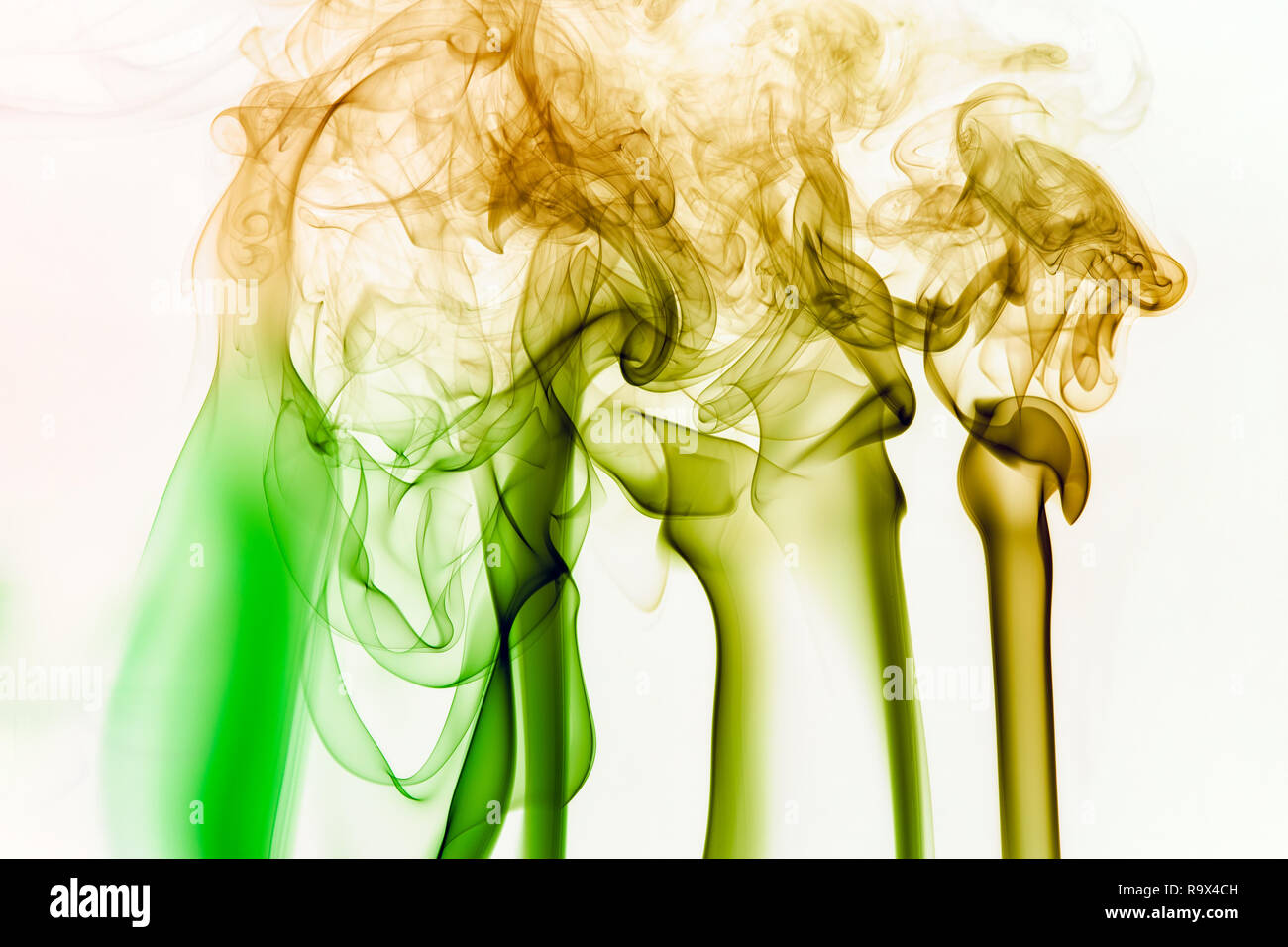 Colorful smoke of incence stick isolated at white background Stock ...