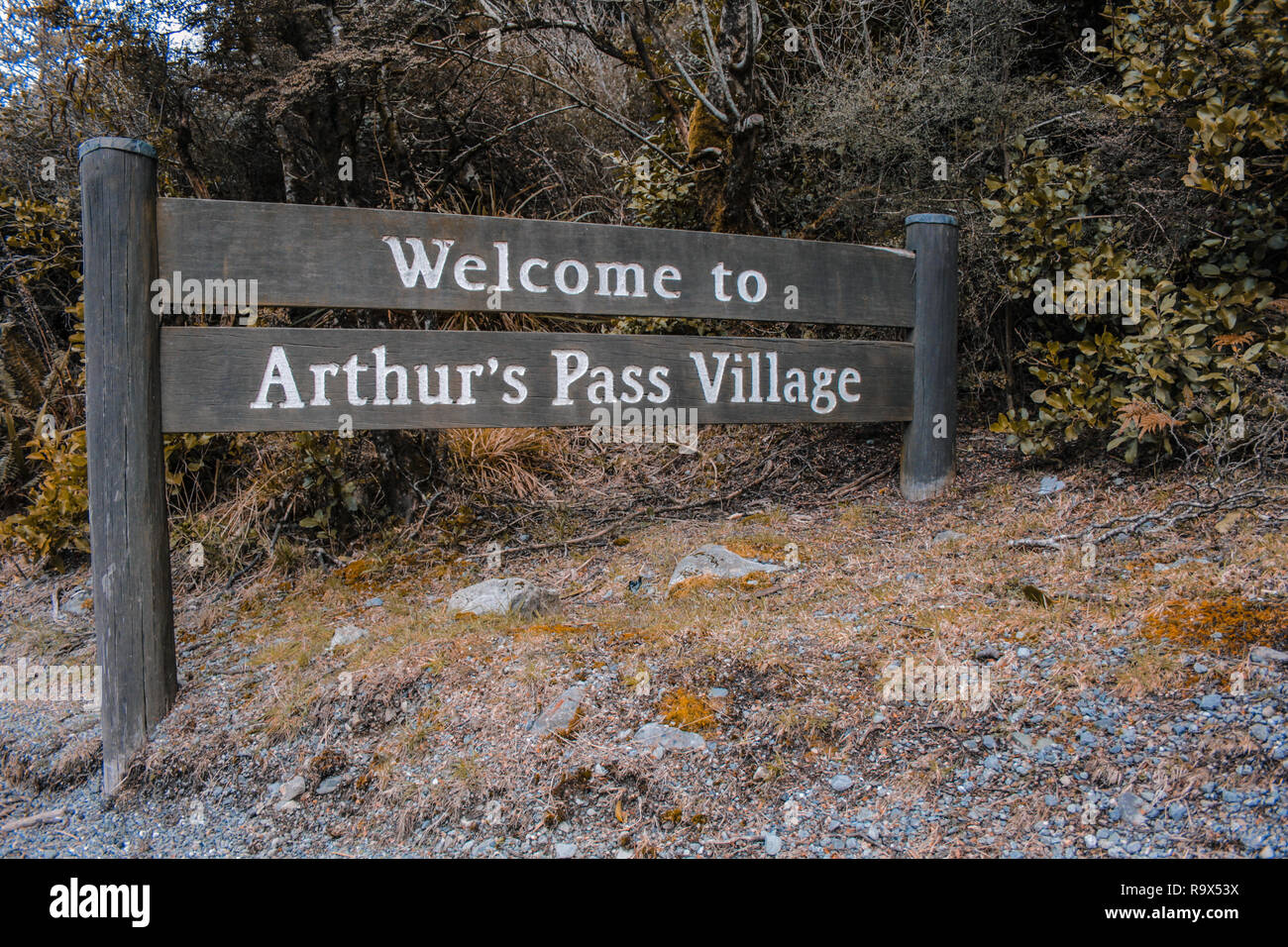 Welcome to Arthur's Pass Village sign, wooden street sign, in Arthur's ...