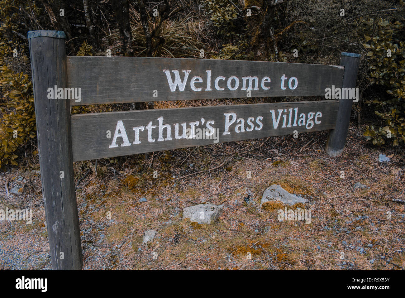 Welcome to Arthur's Pass Village sign, wooden street sign, in Arthur's ...