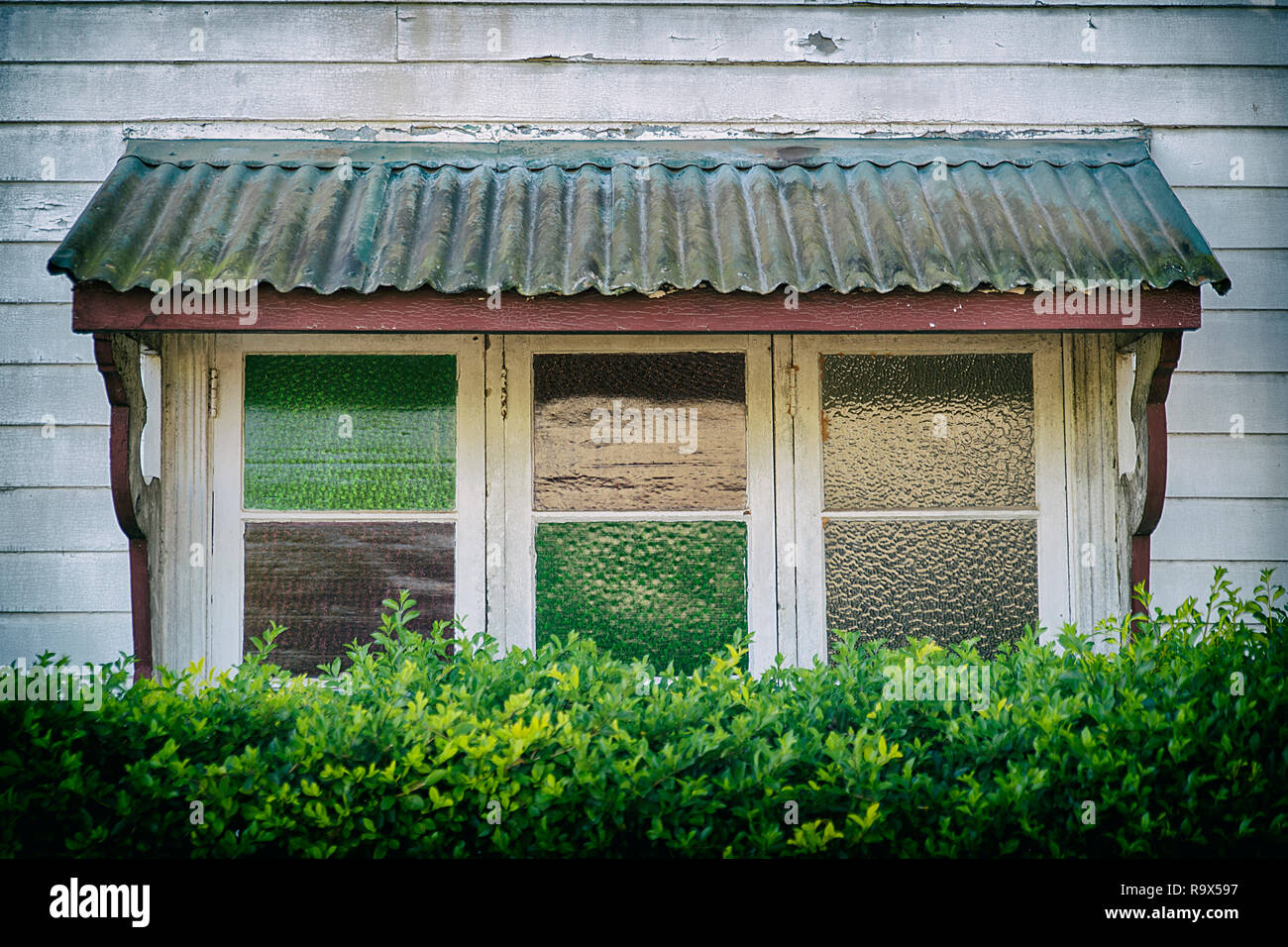 window with green stained glass Stock Photo - Alamy