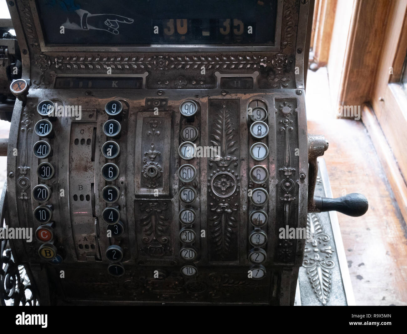 closeupantique vintage cash machine register at retro history museum ...