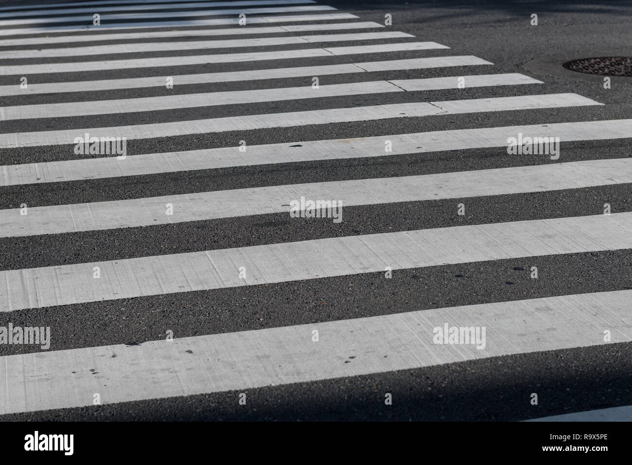Pedestrians crossing empty road hi-res stock photography and images - Alamy
