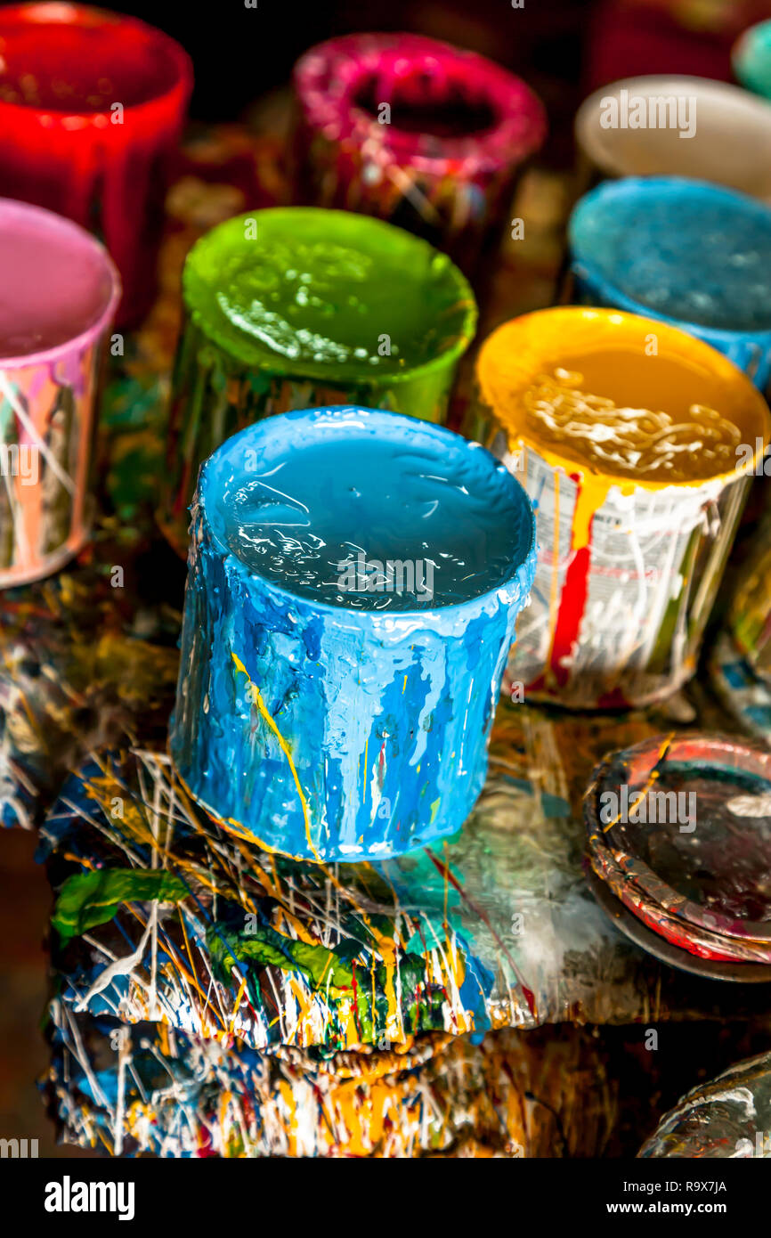 Artist Paint Cans with multiple colors Stock Photo - Alamy