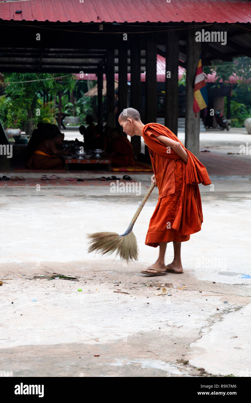 Buddhist monk sweeping hi-res stock photography and images - Alamy