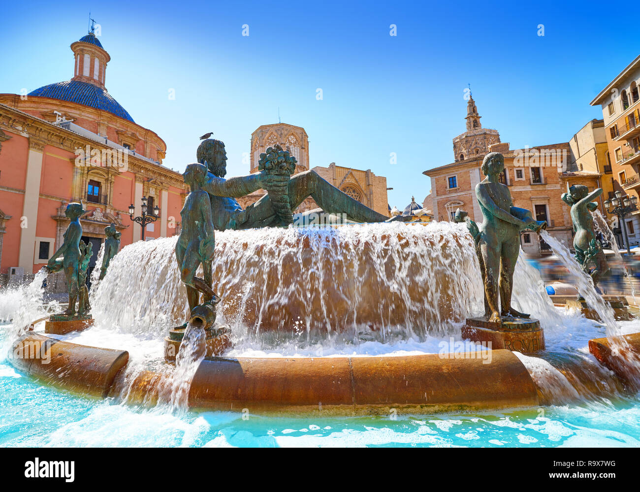 Valencia Turia river fountain in Plaza de la Virgen square of Spain ...
