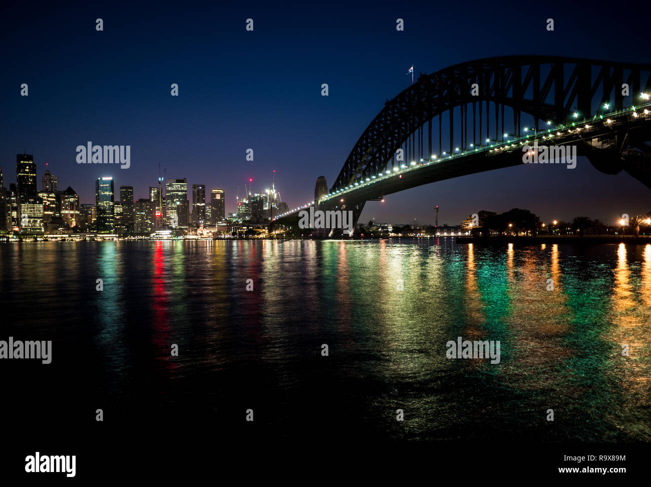 sydney harbour bridge and reflections at dawn Stock Photo - Alamy