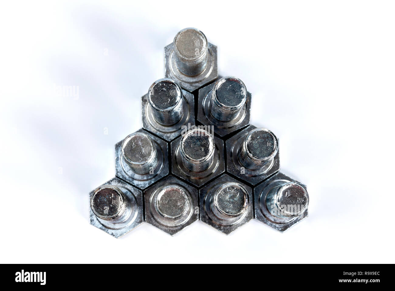 Small metal nuts bolts Cut Out Stock Images & Pictures - Alamy