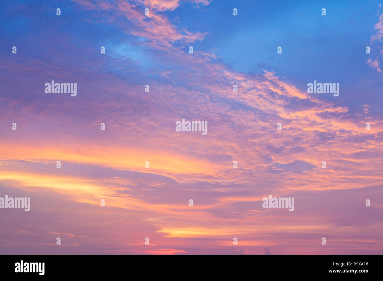Dramatic sunset cloudy sky with picturesque clouds lit by sunset ...
