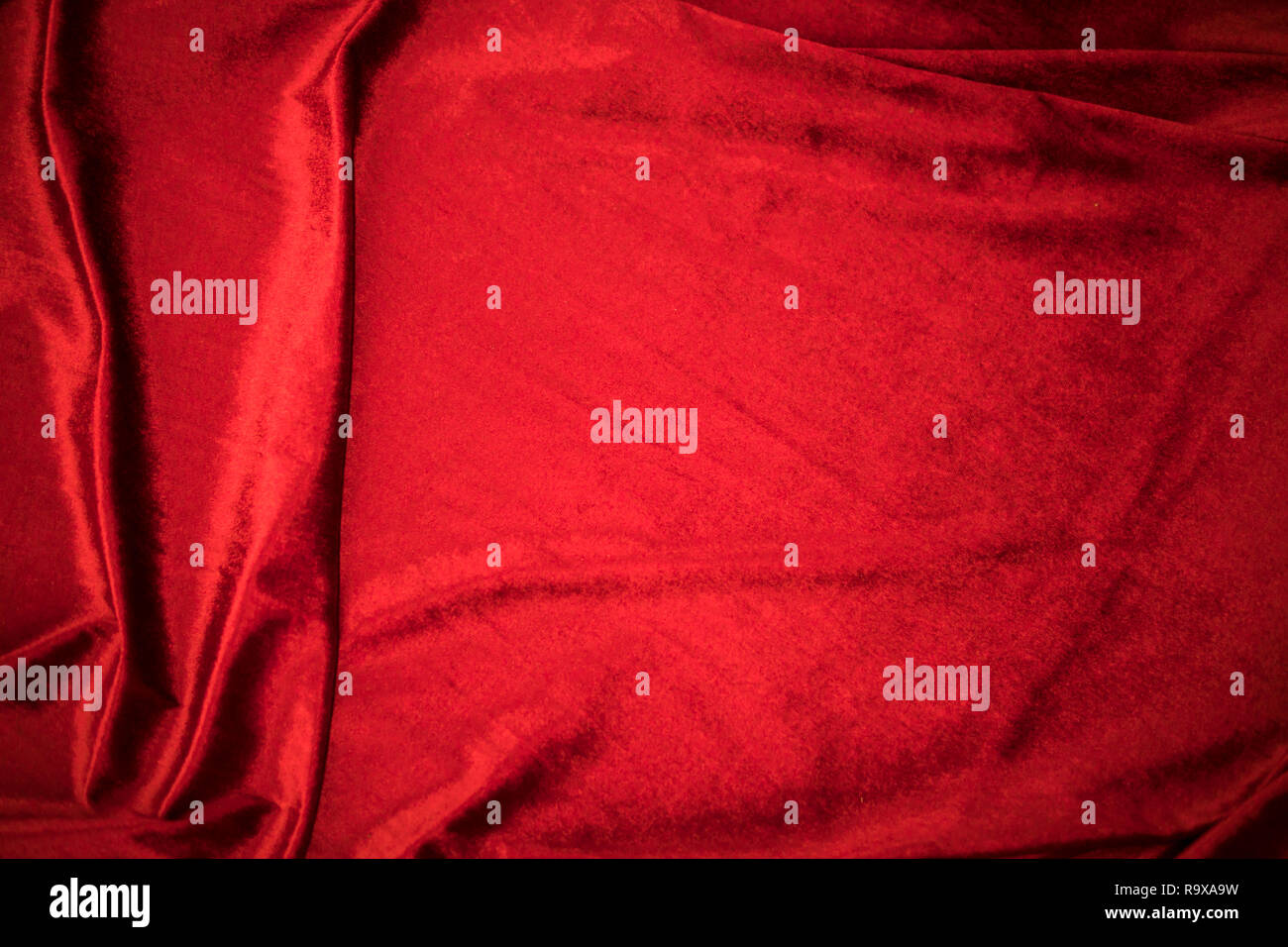 Fold soft waved red velour fabric textured background Stock Photo - Alamy