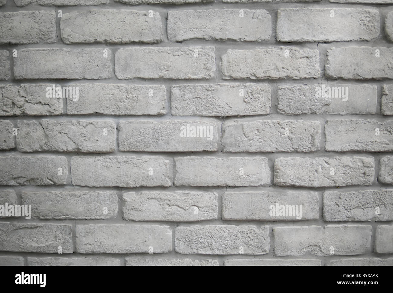 Modern white grey brick wall textured background Stock Photo - Alamy