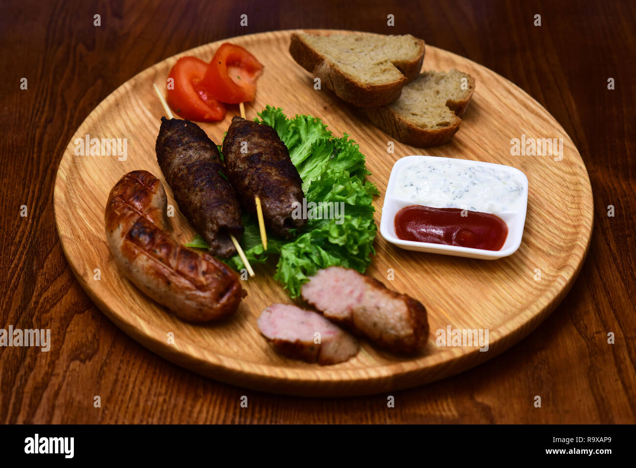 Fast food. Eastern food. Dishes of oriental cuisine lying on board and ...