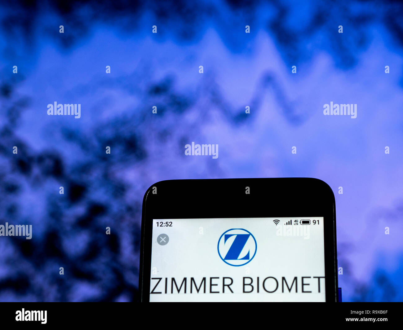 Zimmer Biomet Company logo seen displayed on smart phone Stock Photo ...