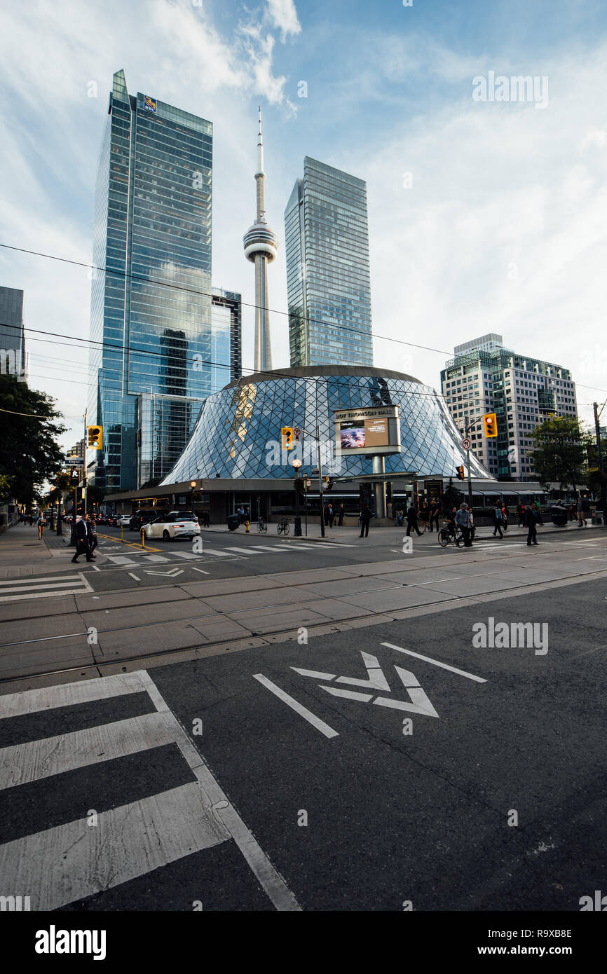 Street activity in Toronto downton, CN tower at the background Stock ...